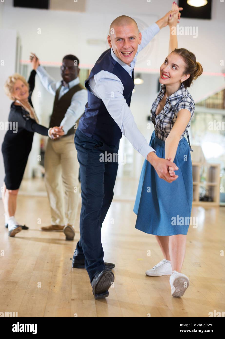 Man and woman learning to dance classical ballroom dance Stock Photo ...