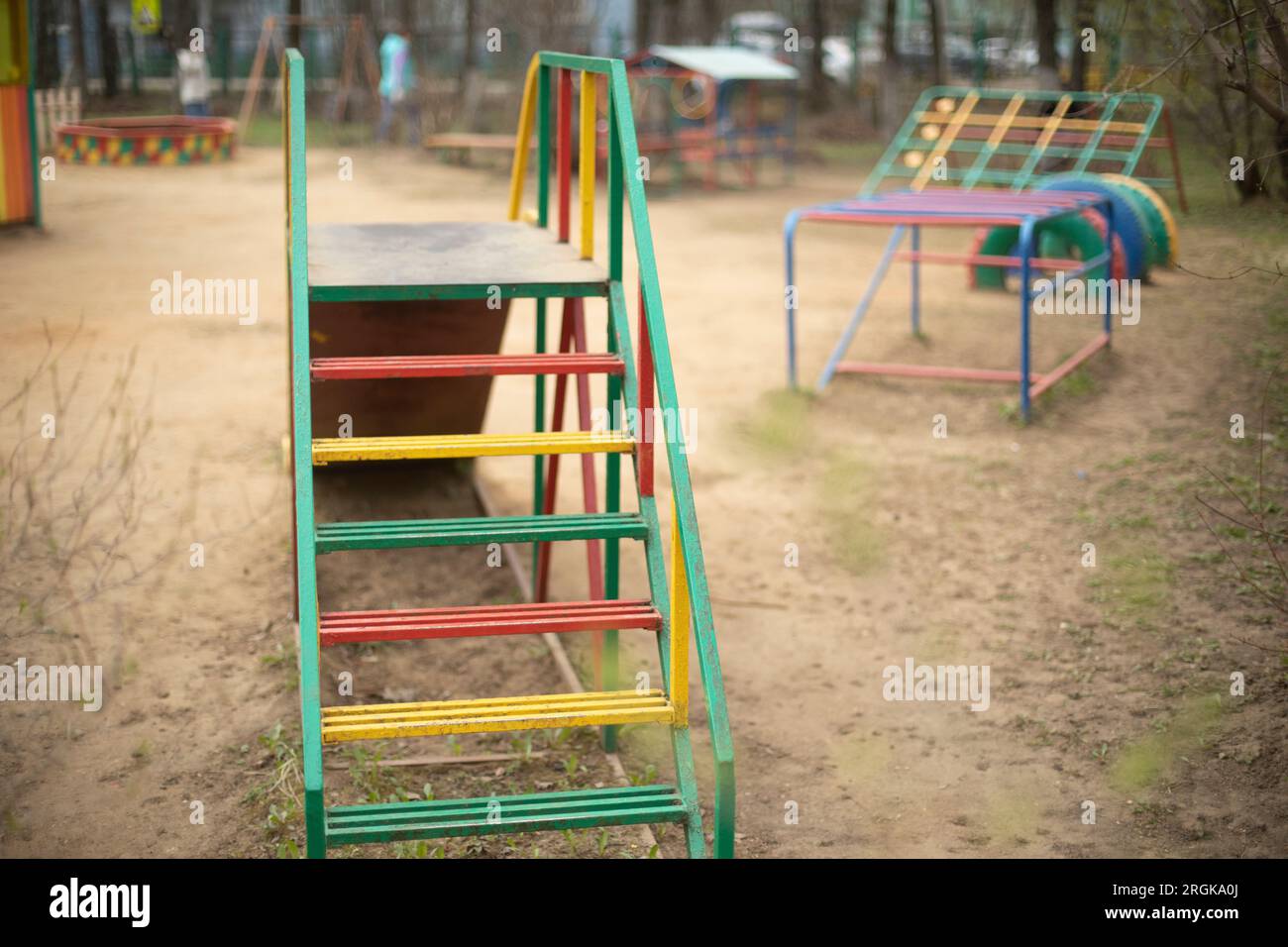 Children's playground. Old slide for children. Children's area. Steel ...