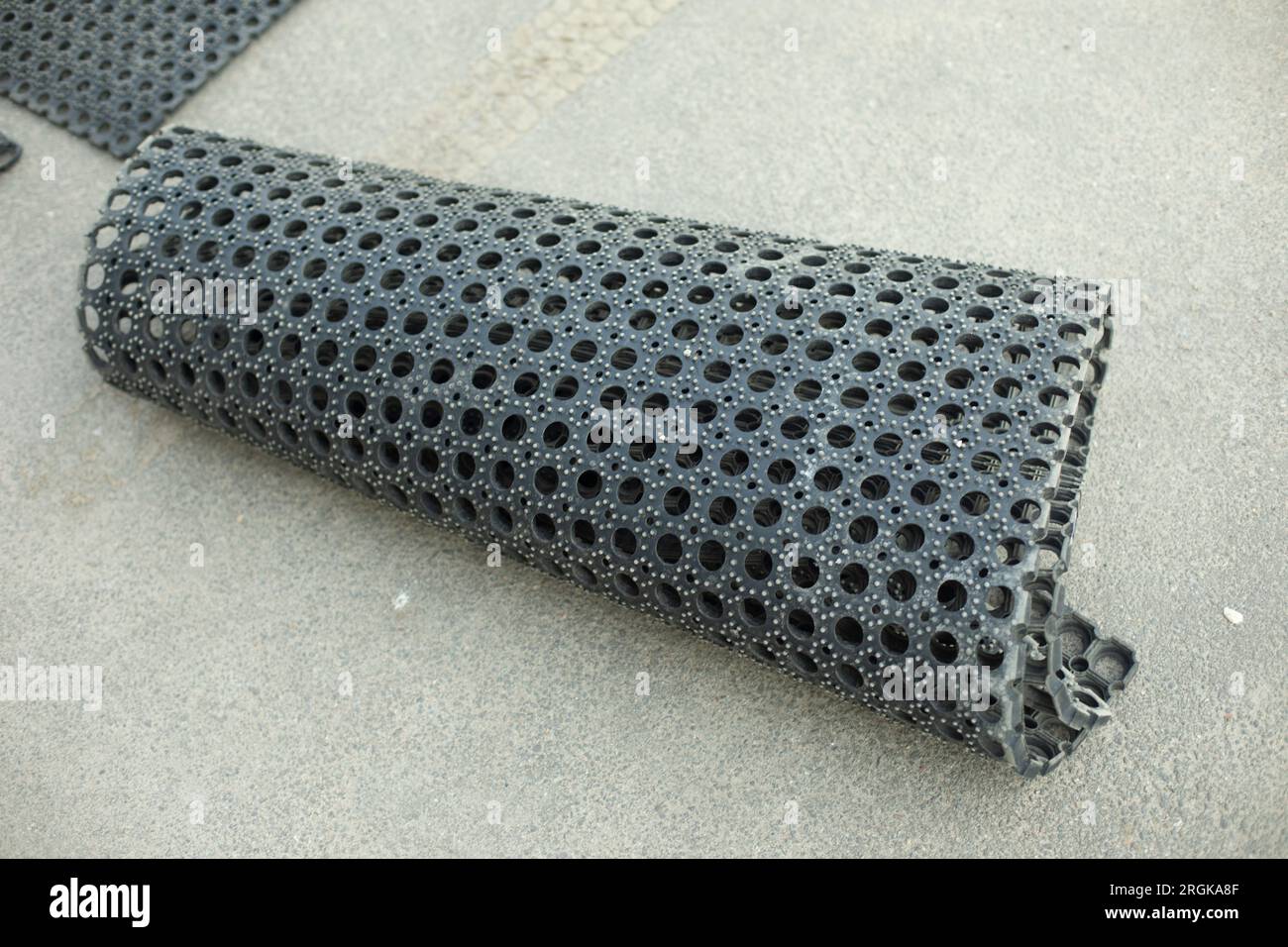 Rubber mat. Carpet in dust. Rubber coating. Cleaning mat. Cleaning from ...