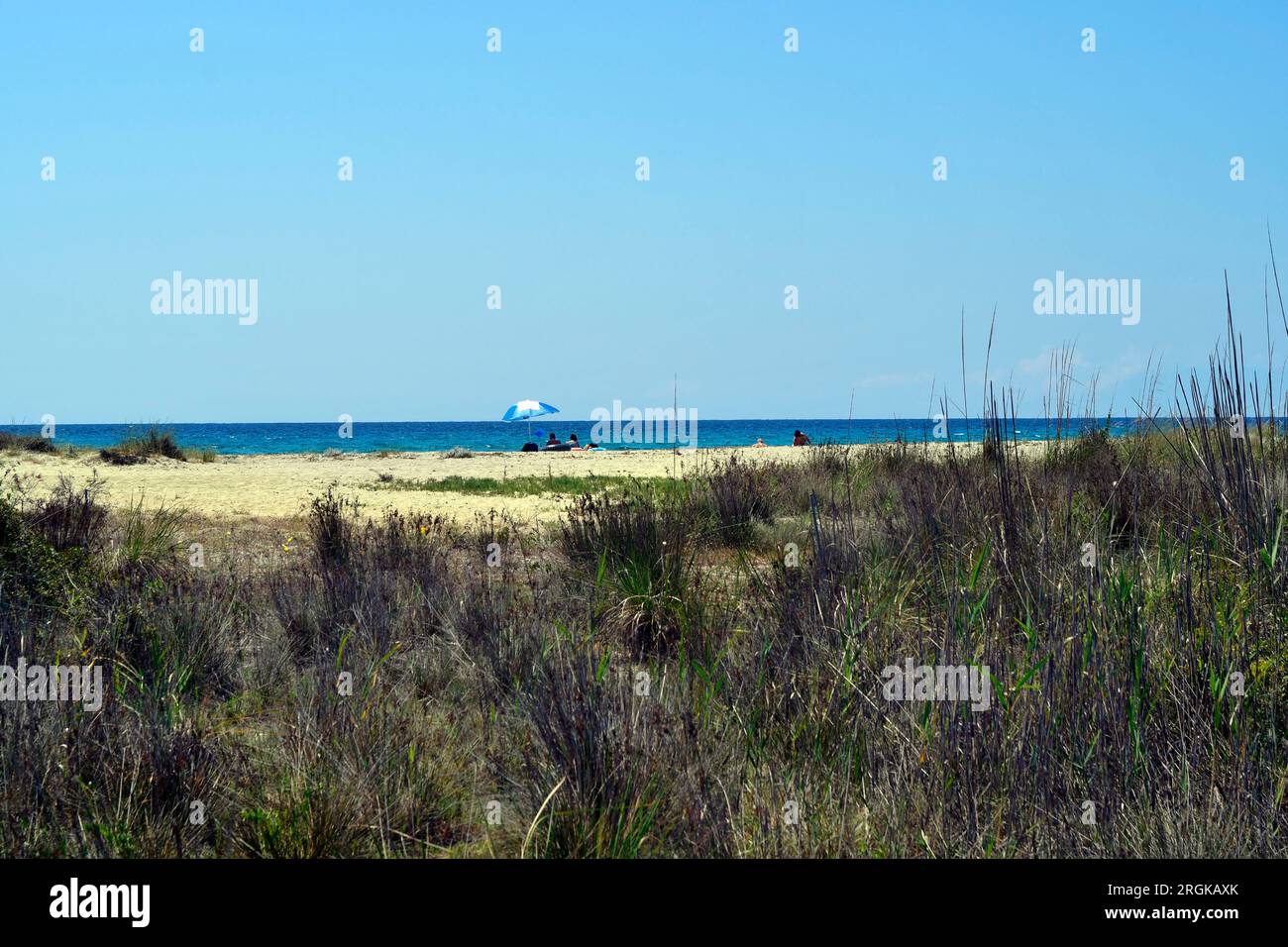Greece, Halkidiki, peoplee relax at Possidi cape with sandy beach on ...