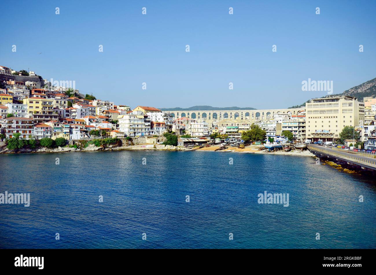 Greece, Kavala, medieval aqueduct Kamares, wharf and buildings around ...