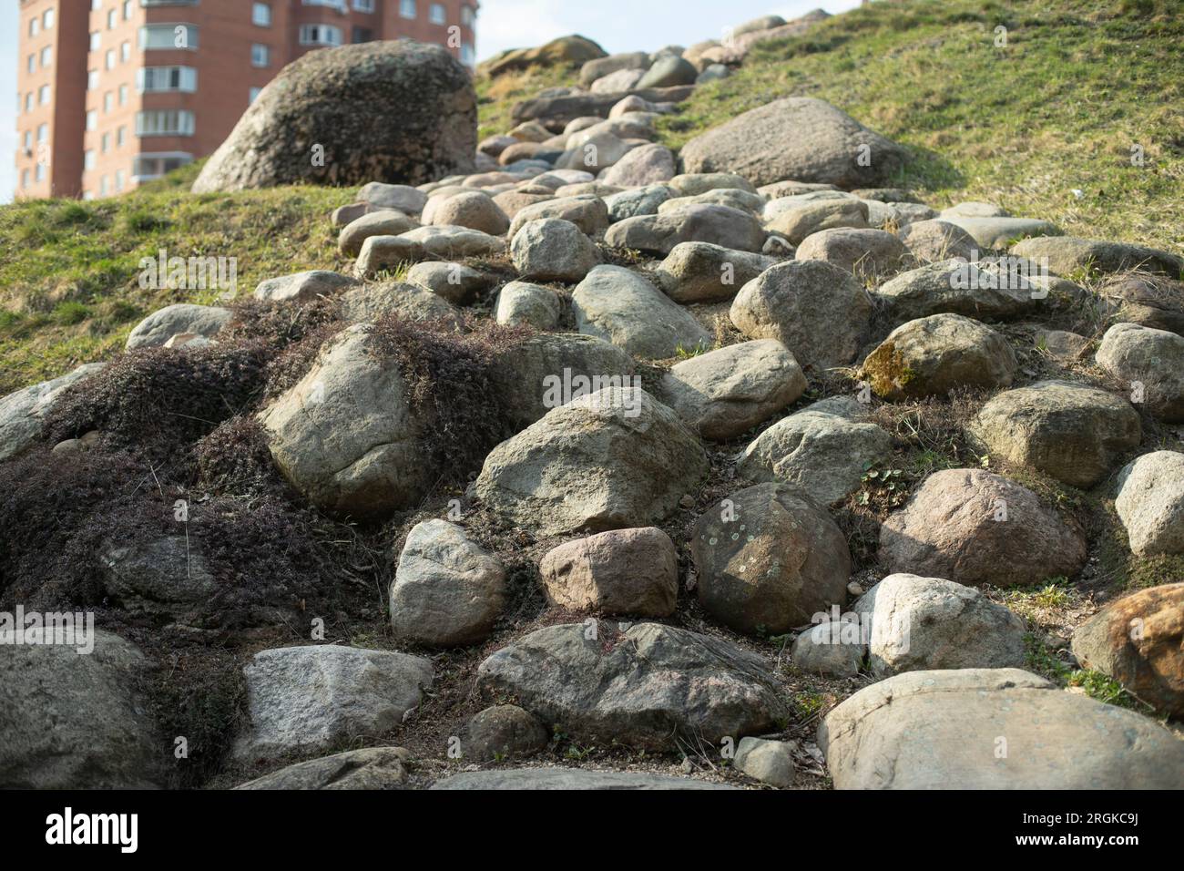 Stones in park. Slide of stones. Artificial waterfall. Landscaping ...