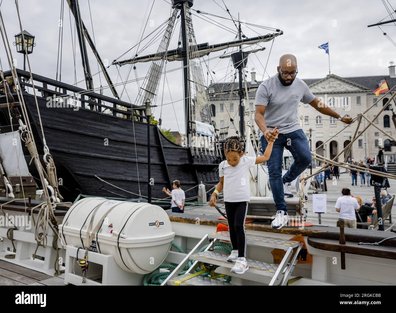 AMSTERDAM - Visitors to the Maritime Museum on a Spanish modern sailing ship from 1917. Next to ...