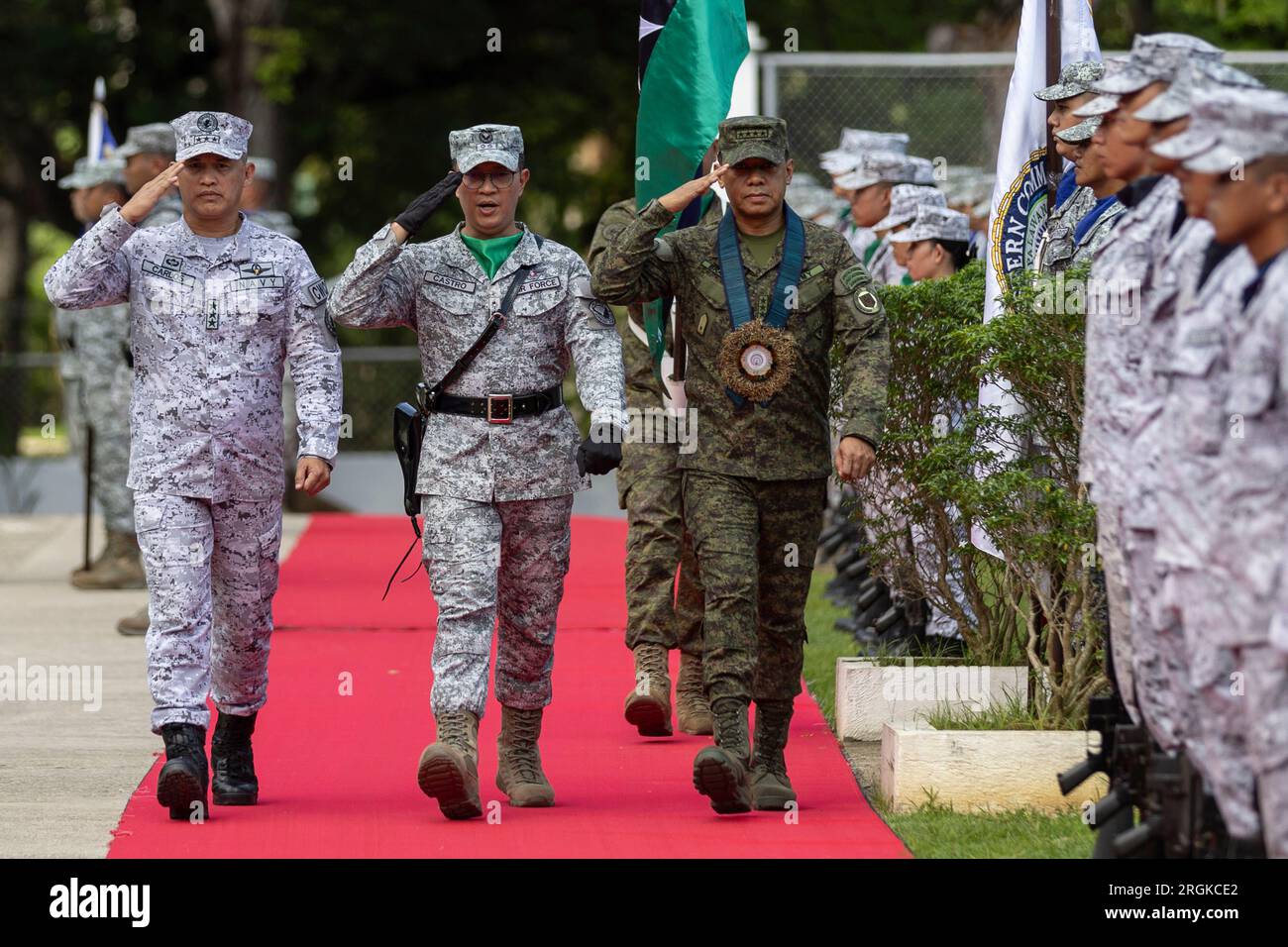 Armed Forces of the Philippines Chief of Staff General Romeo Brawner Jr., right, marches with ...