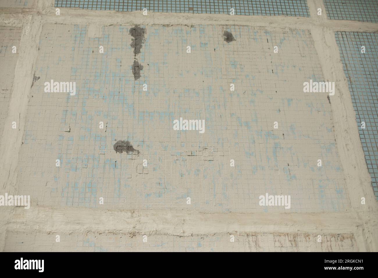 Wall of building without windows. Tiles on building. Architectural ...