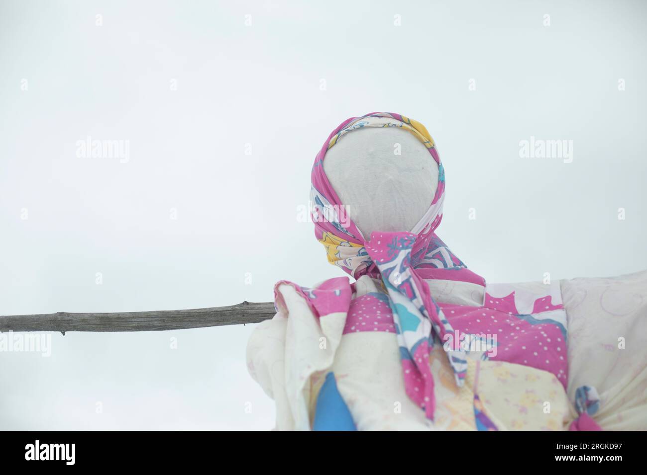 Symbol of spring in Russia. Pagan symbol of winter. Rag doll. Burning ...