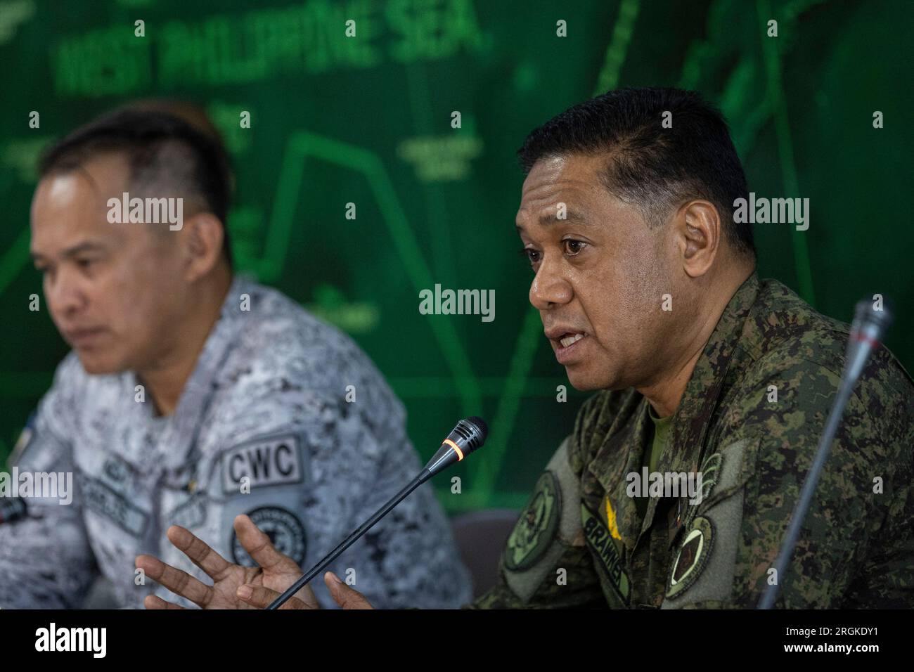 Armed Forces of the Philippines Chief of Staff General Romeo Brawner Jr., right, and the chief ...