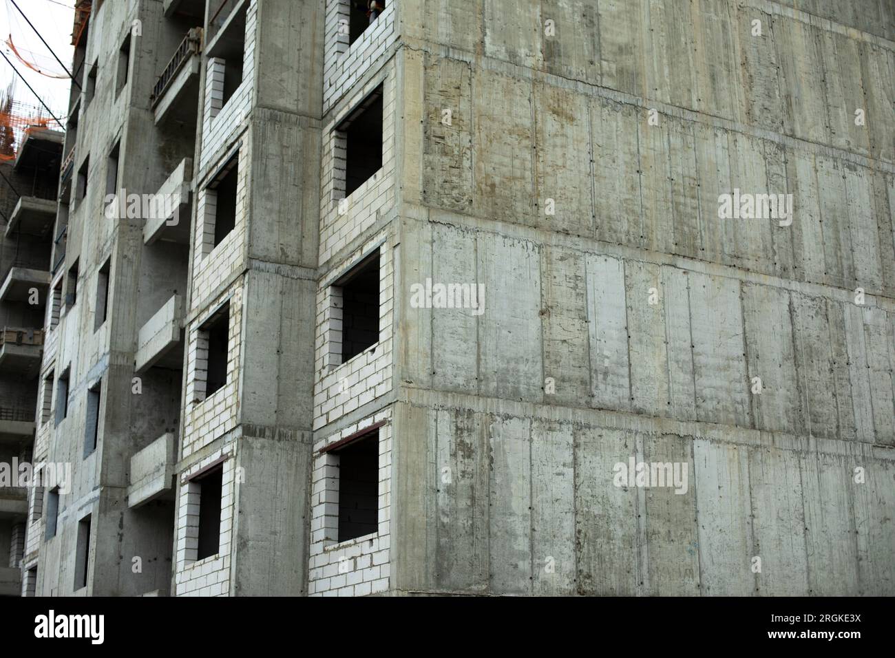 Building house. New building. Concrete frame. Construction of high-rise ...