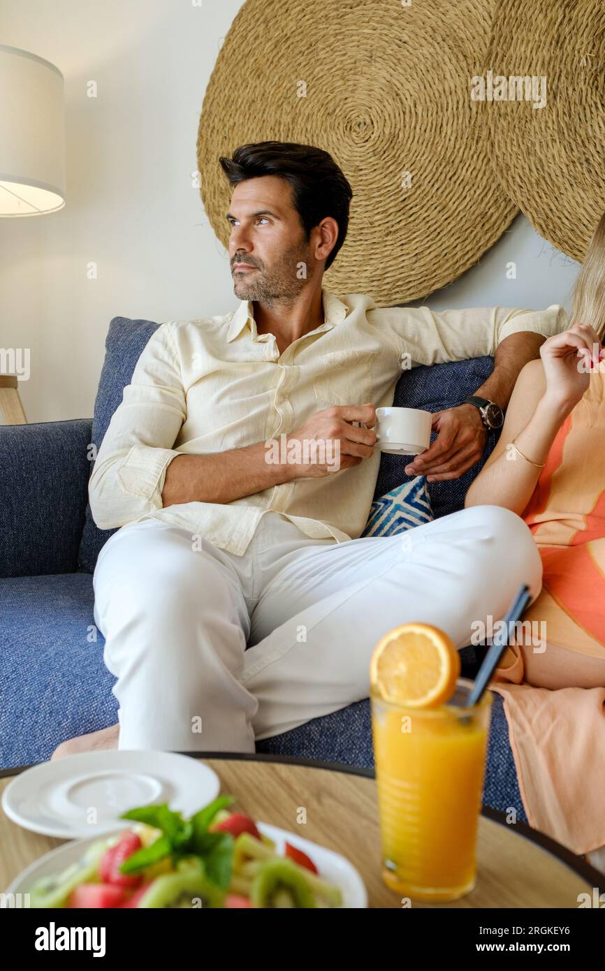 Female male masculine sofa hi-res stock photography and images - Alamy