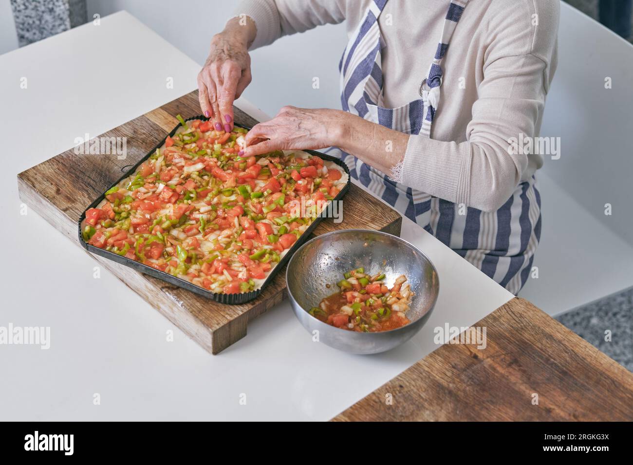 Female chief cook chopping vegetables hi-res stock photography and ...