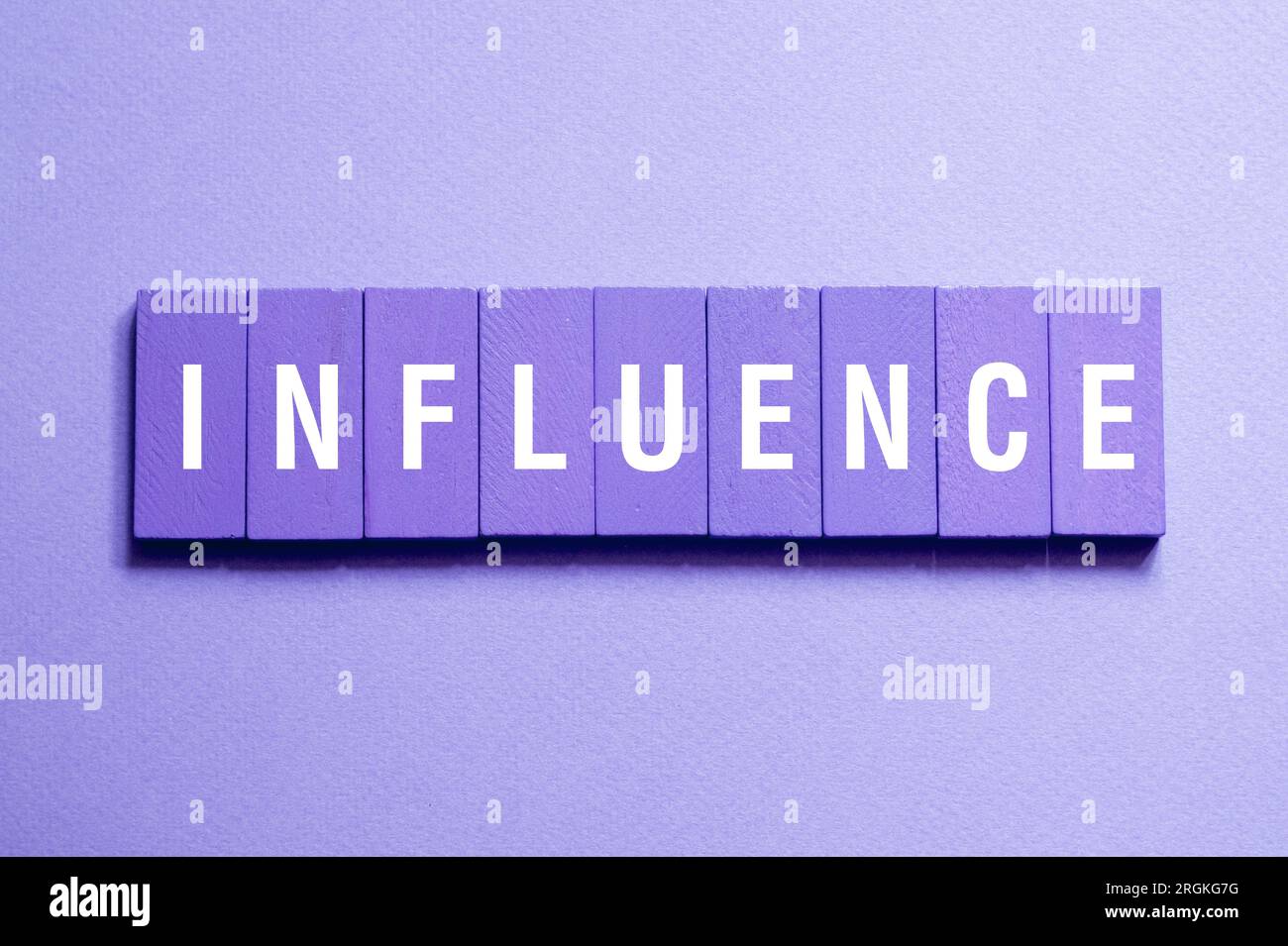 Influence - word concept on building blocks, text Stock Photo - Alamy