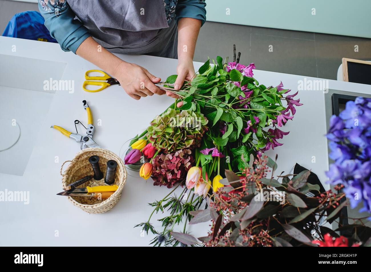 Woman cutting small flowers from hi-res stock photography and images ...