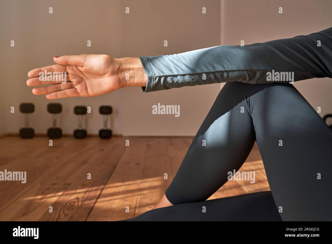Arm on knee hi-res stock photography and images - Alamy