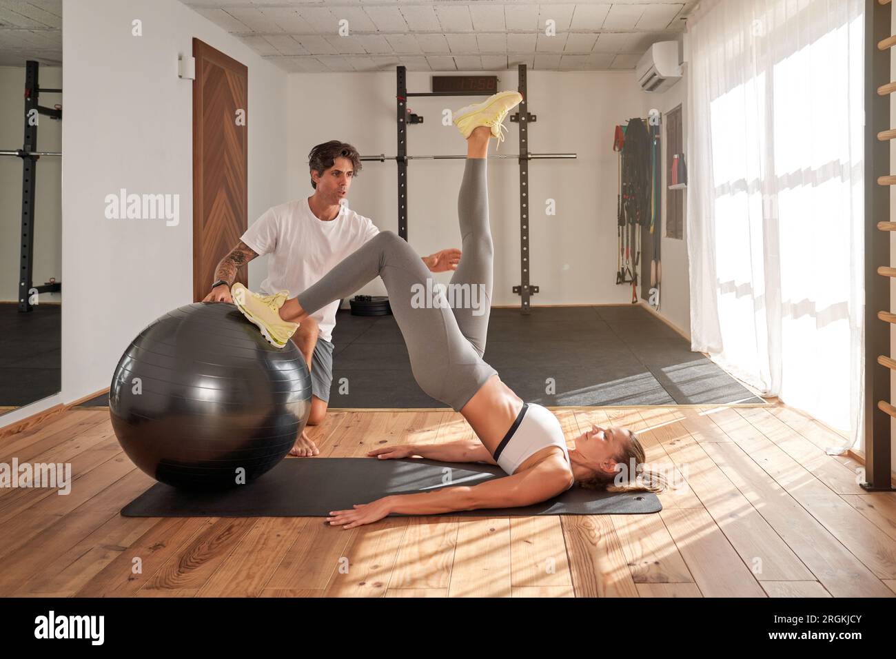 Man bridge gym ball hi-res stock photography and images - Alamy