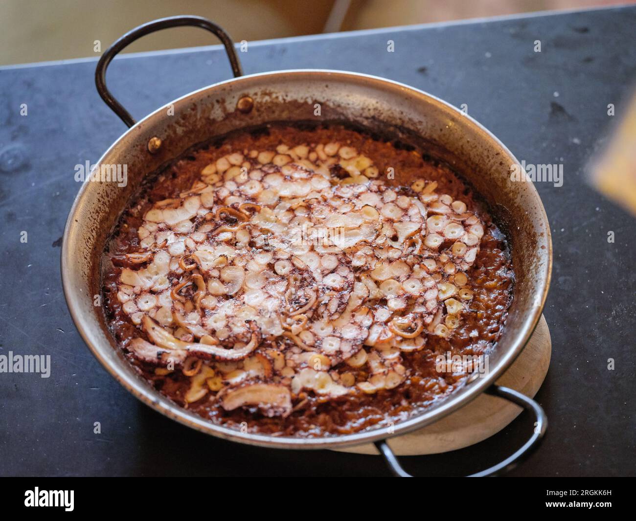Top view of shallow pan with traditional dish of seafood and rice on ...