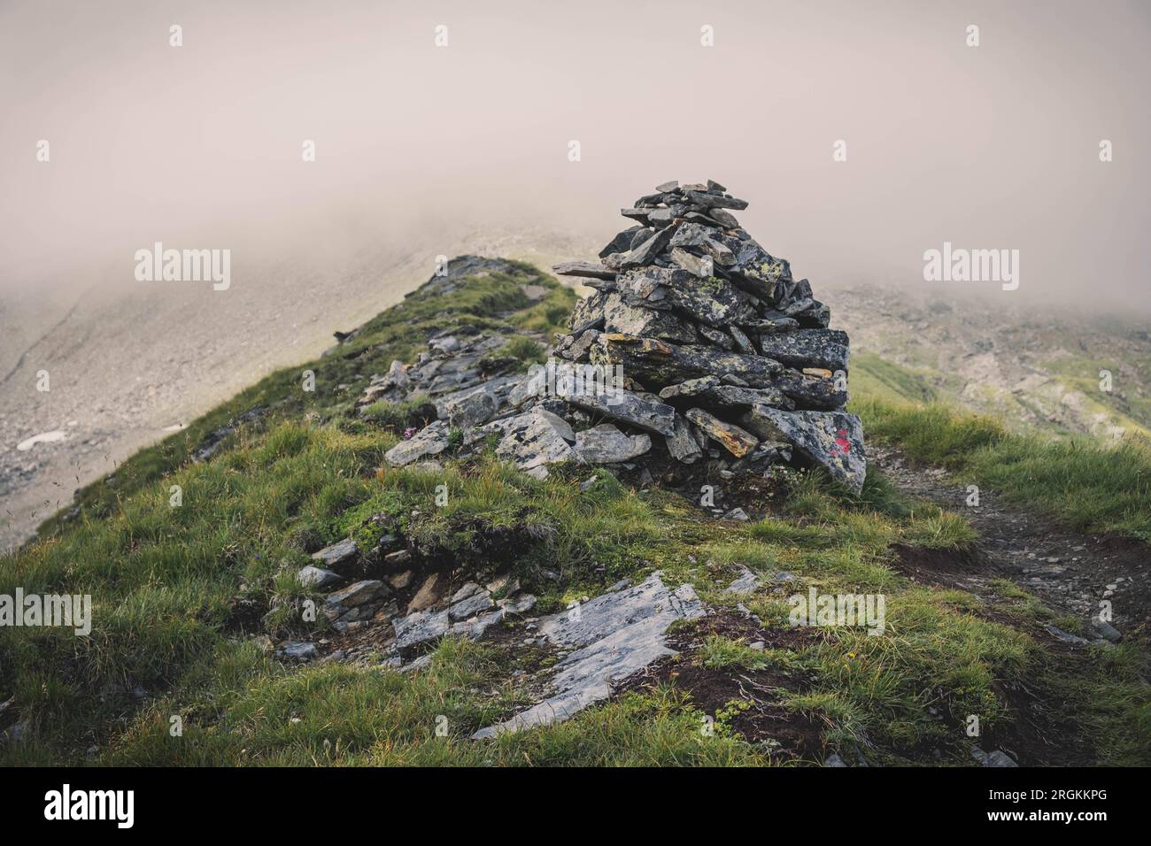 A beautiful trail in the mountains, background, Stone Pyramid with ...