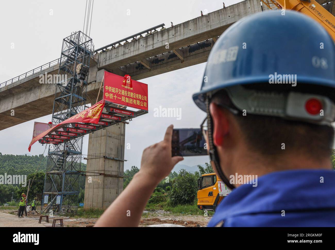Qingyuan, China's Guangdong Province. 10th Aug, 2023. A worker takes ...