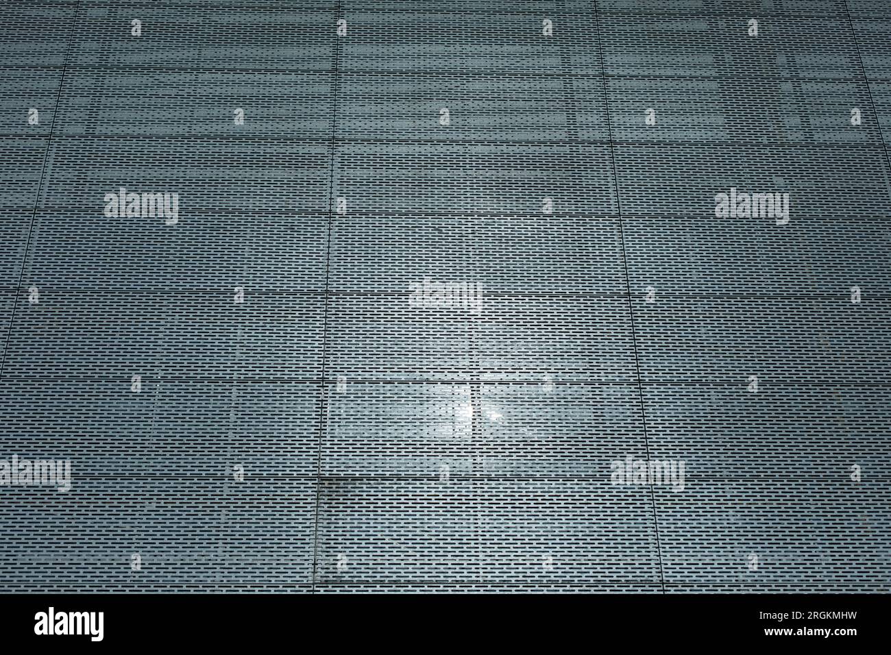 Steel wall of building. Grille on wall. Office building. Texture ...