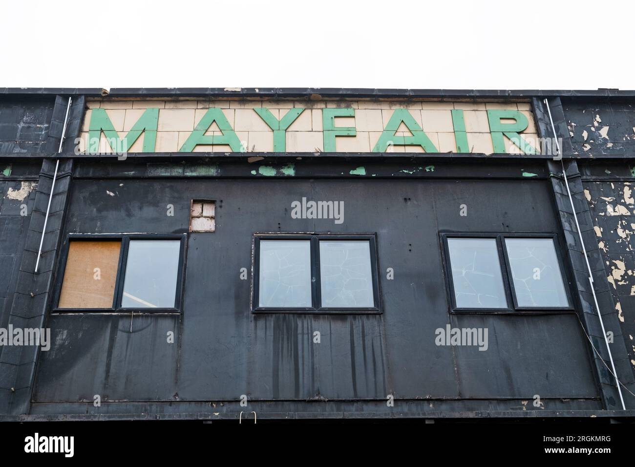 MAYFAIR vintage sign on top of storefront building in Brick Lane East ...