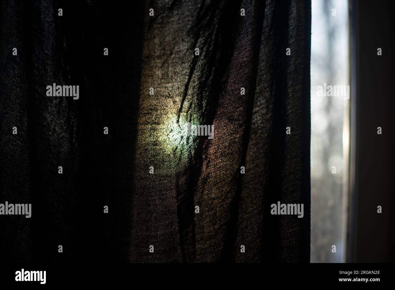 Light through fabric. Curtain on window. Black fabric texture on lumen ...