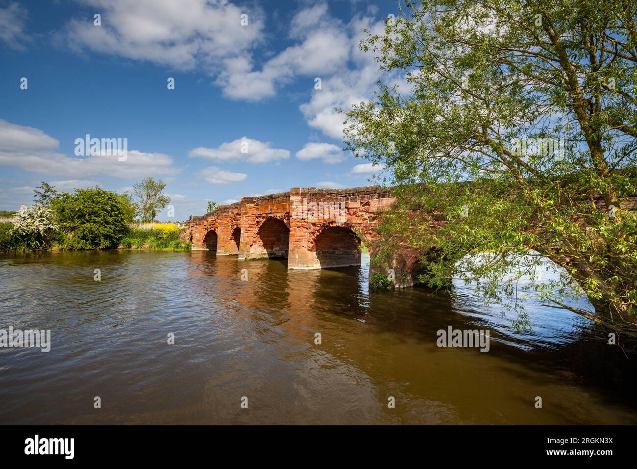 The sandstone bridge over the River Avon at Eckington Wharf ...