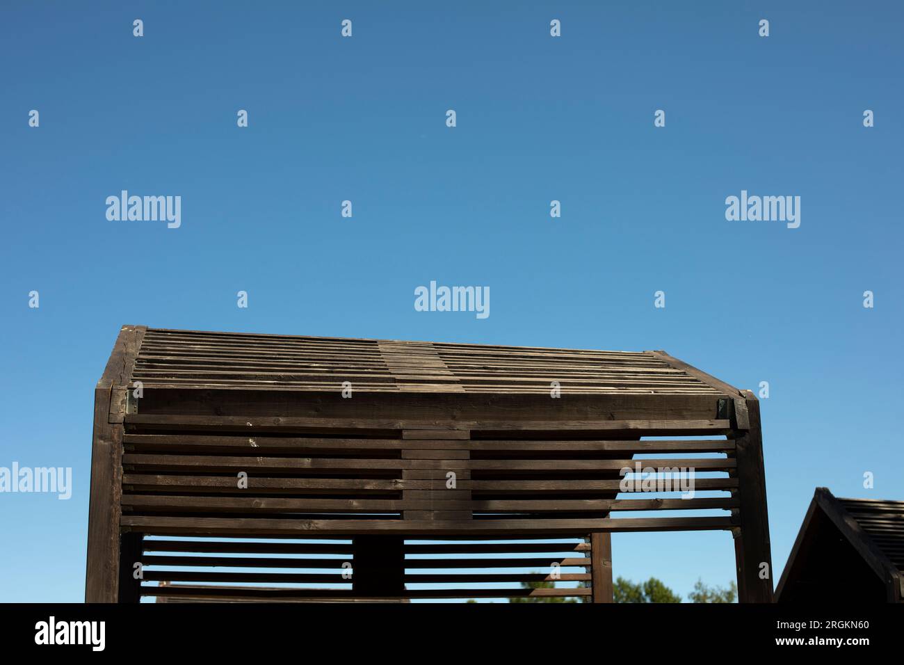 Roof of house made of boards. Building of lags. Architectural details ...