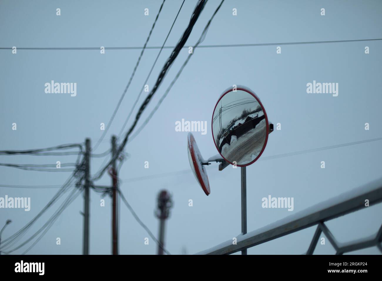 Spherical mirror for safety. Spherical mirror on road. Reflection in ...