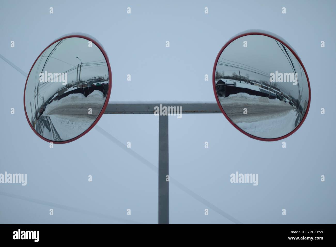 Spherical mirror for safety. Spherical mirror on road. Reflection in ...