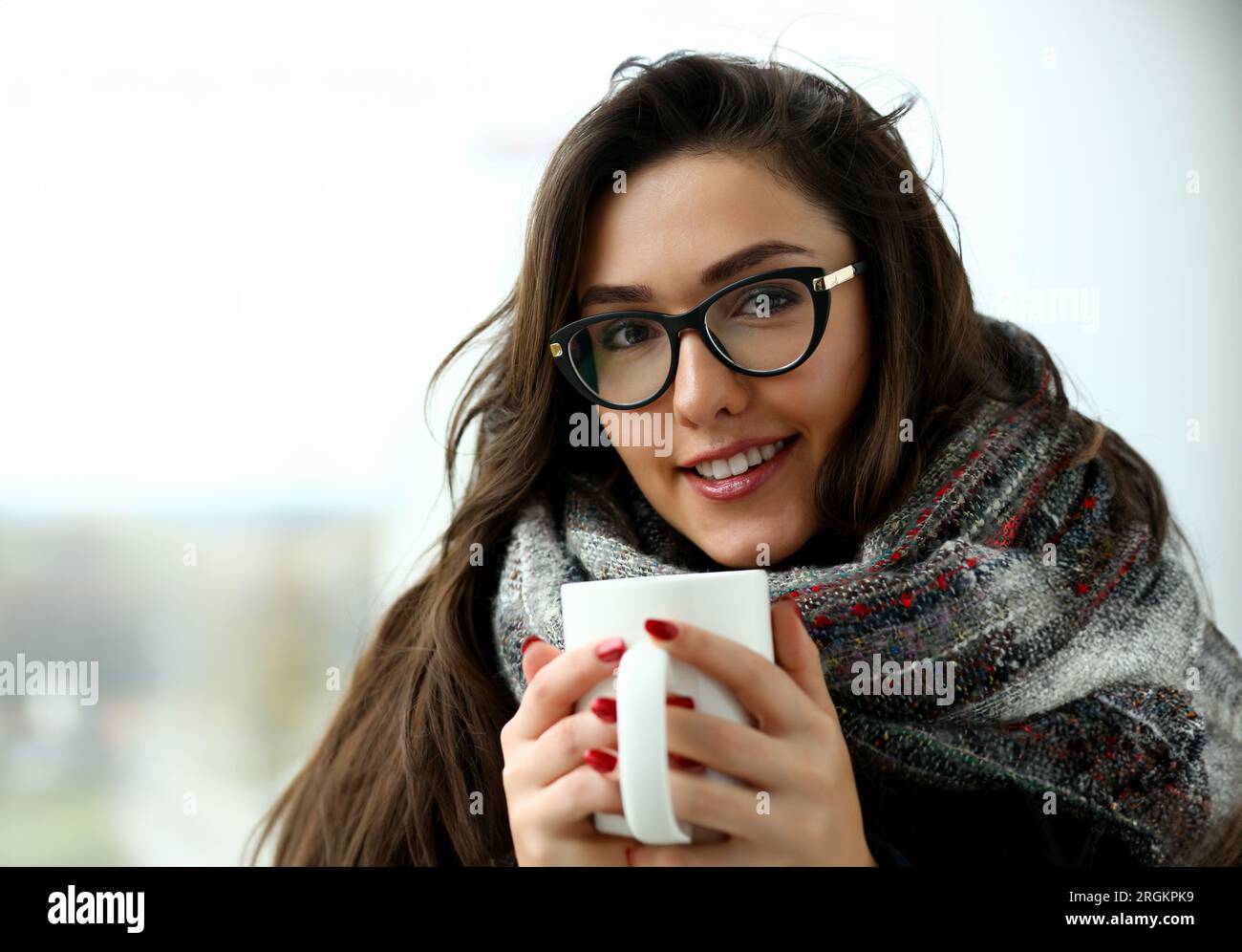 Beautiful smiling girl hold in arms cup portrait Stock Photo - Alamy