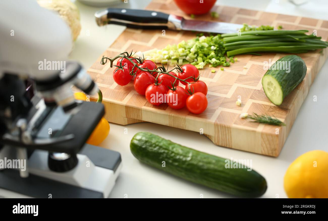 Microscope head on kitchen background Stock Photo - Alamy