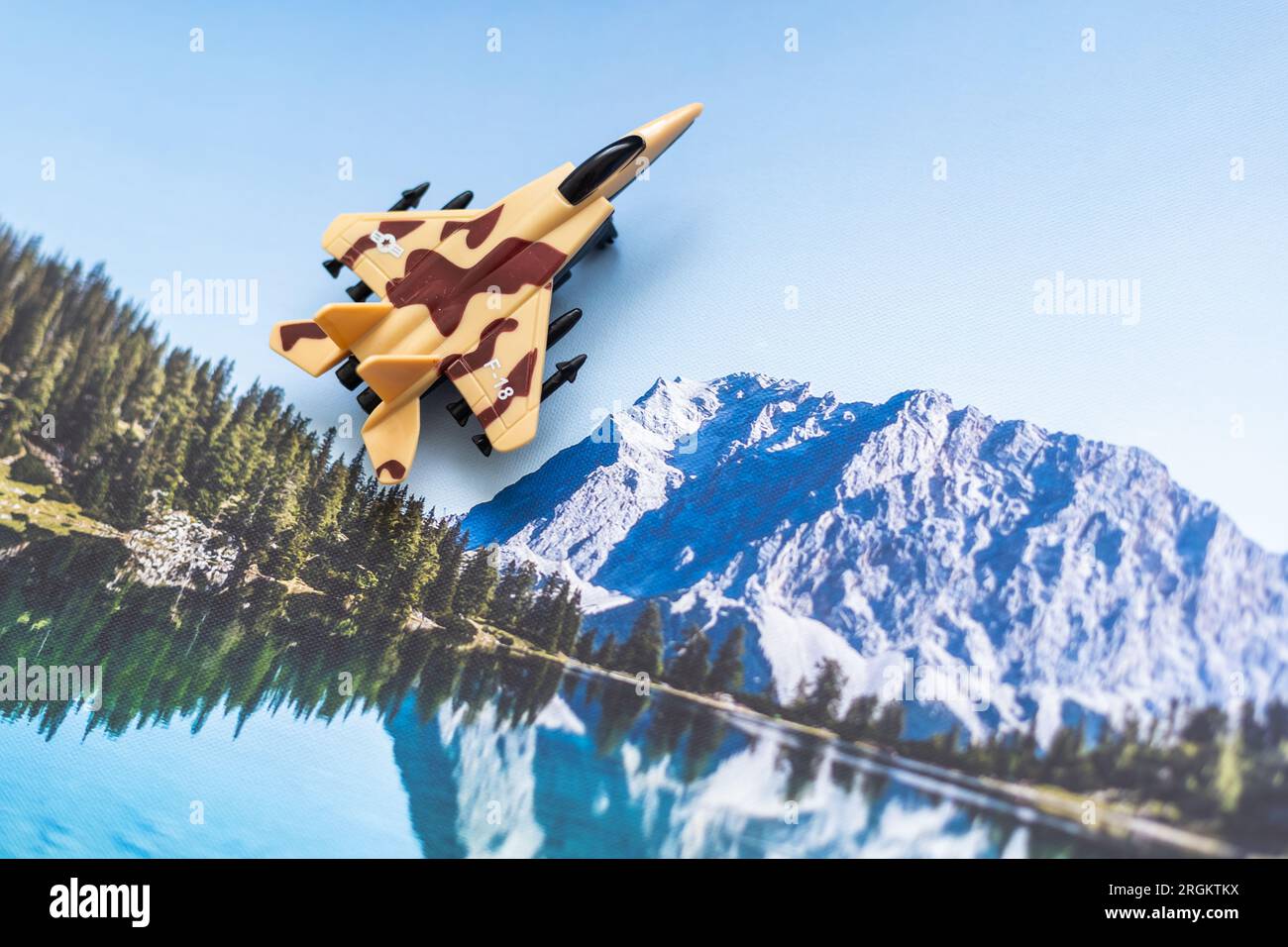 Military Fighter Jet flying over the mountain peaks. 3d Rendering ...