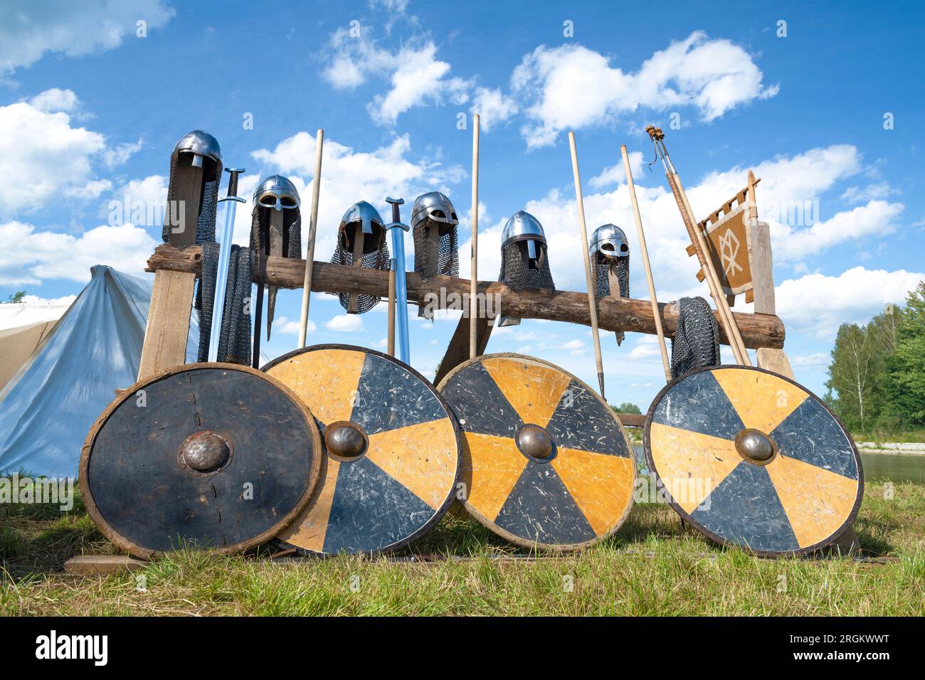 SHEVELEVO, RUSSIA - AUGUST 06, 2023: Rack with medieval weapons and ...