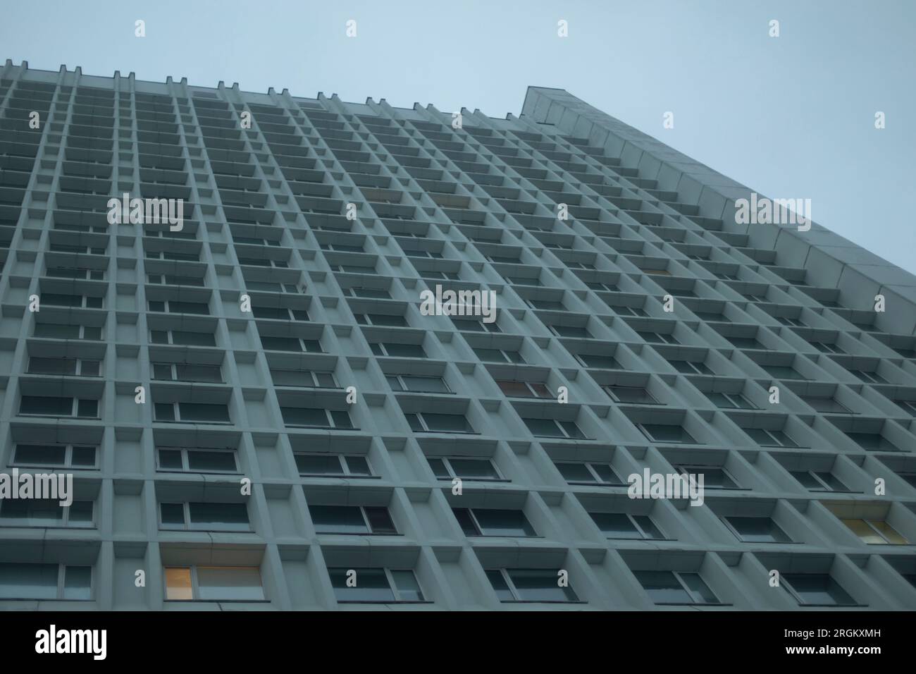 Lots of windows in skyscraper. High-rise building in city. Offices on ...