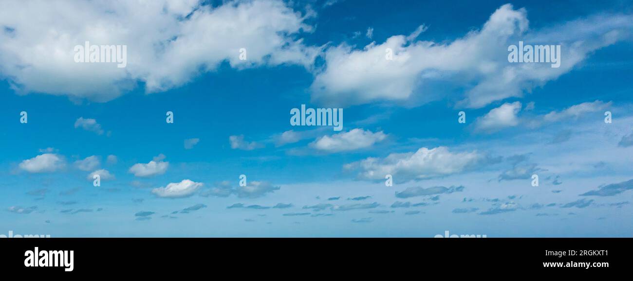 Image of a partly cloudy and partly clear sky during the day without ...