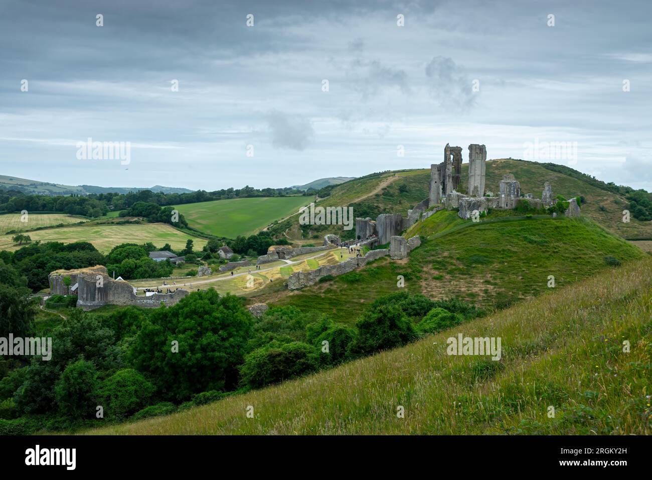 View of the ruins of Corfe Castle from a hillside opposite Stock Photo ...