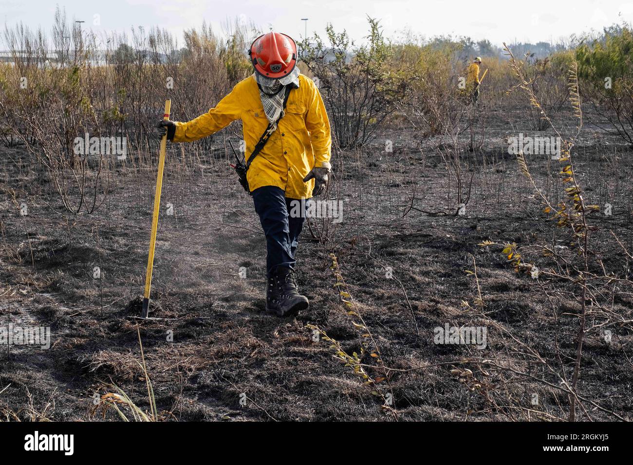 August 10, 2023: Austin Fire Department Firefighters mop-up after a ...