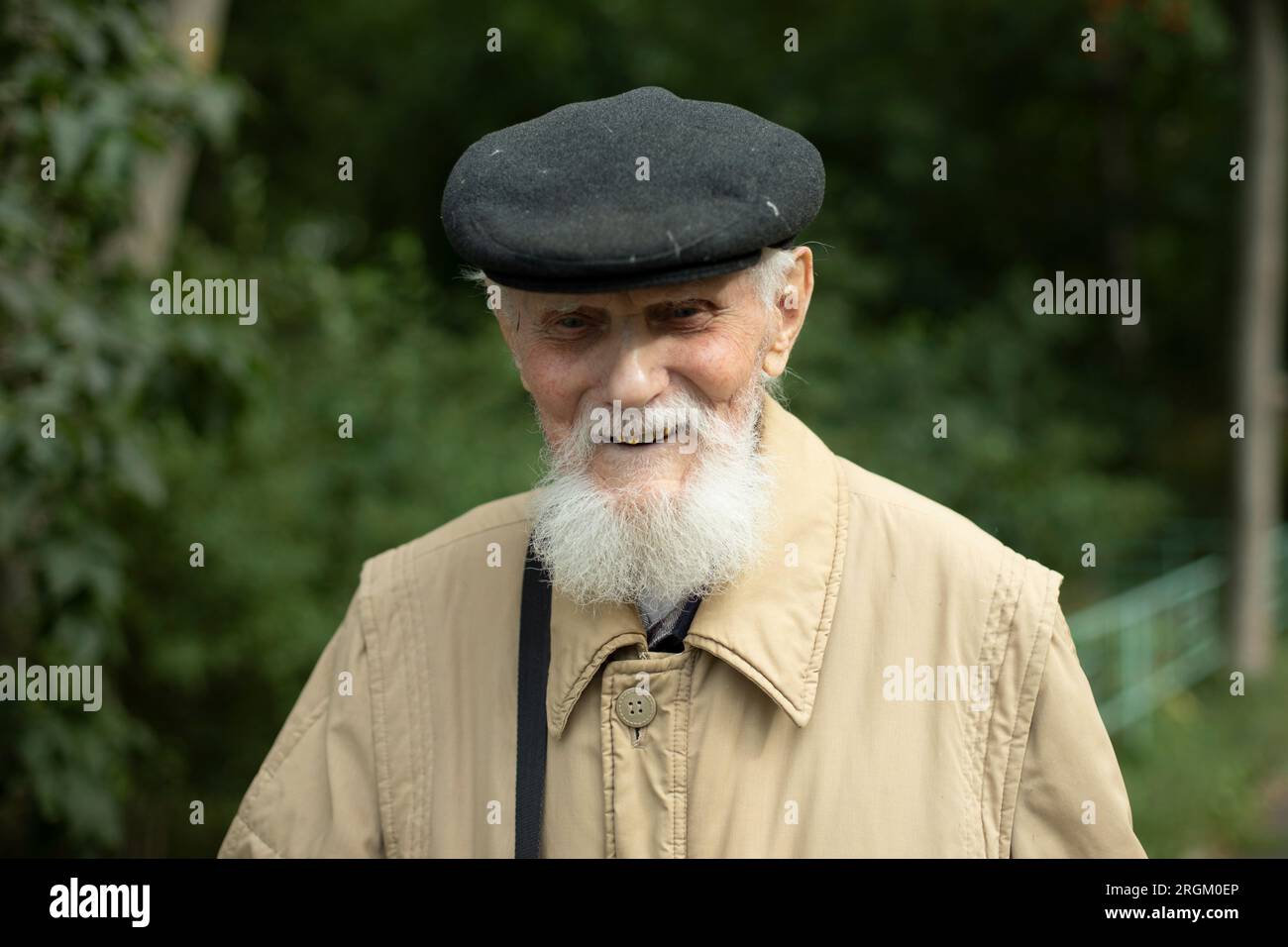 Happy old man. Grandfather's gray beard. Man of 90 years. Russian ...