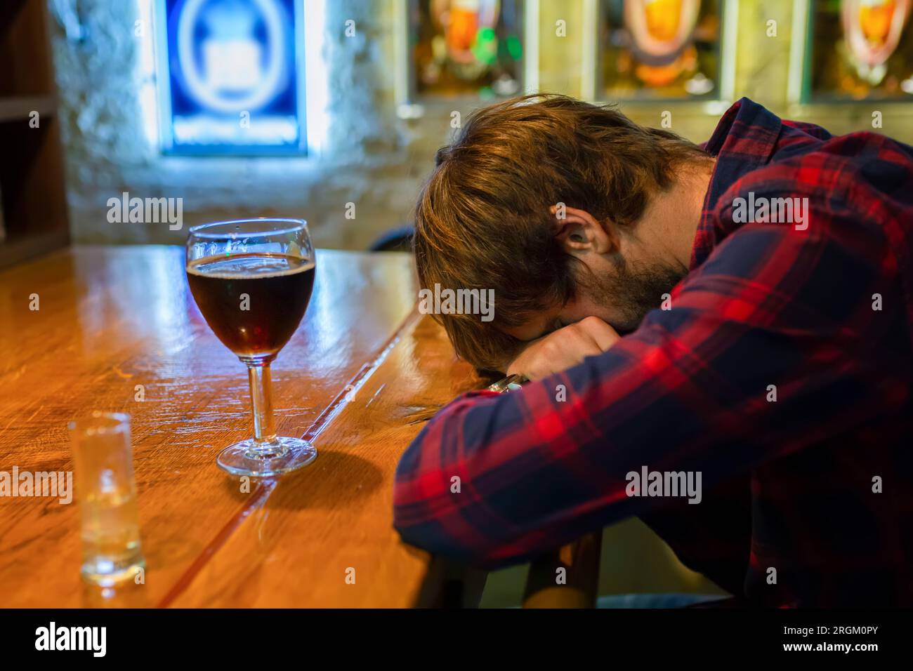 Unhappy man in pub portrait hi-res stock photography and images - Alamy
