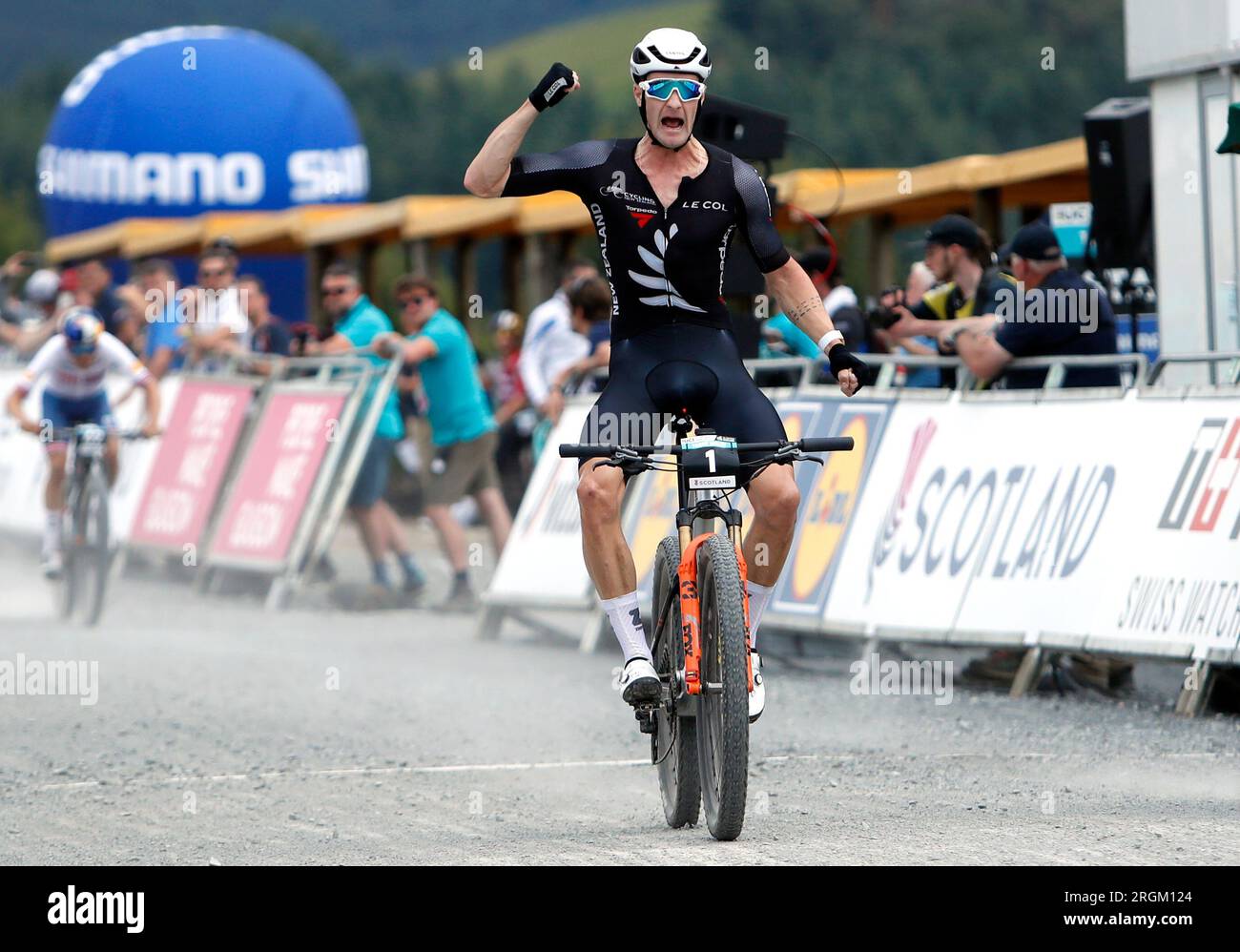 New Zealand's Samuel Gaze celebrates after completing the Men Elite ...