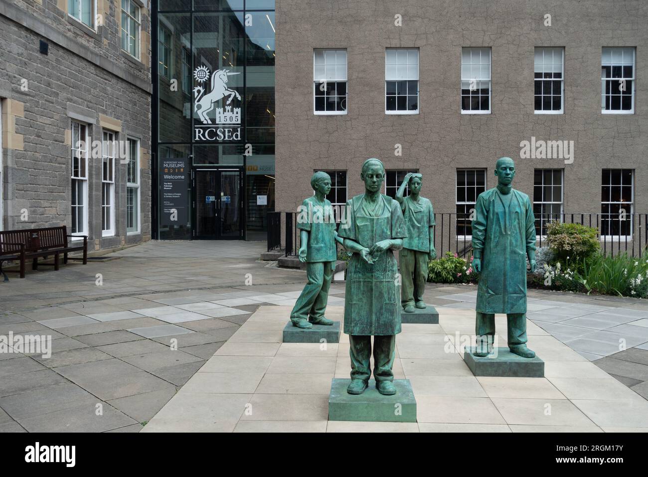 Group of sculptures of medical staff reflecting after a Covid shift ...