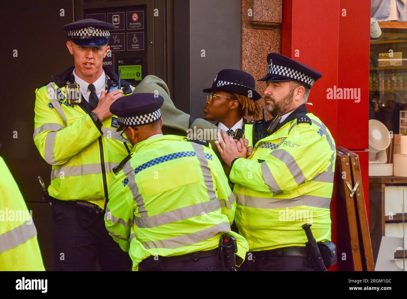 Police arresting young man hi-res stock photography and images - Alamy