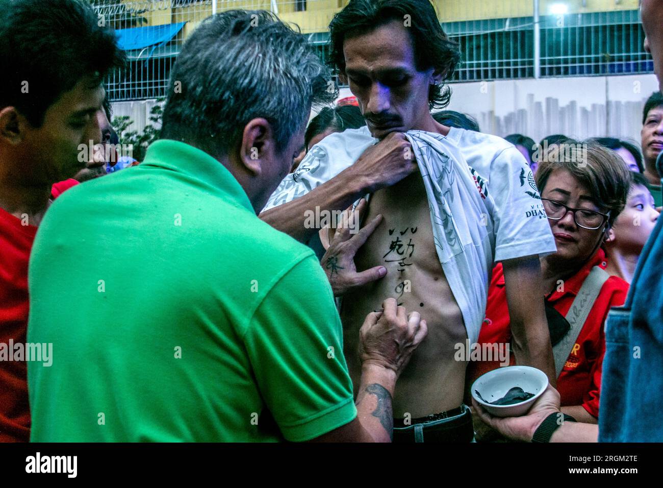 The Tangsin ritual procession during the Sejit celebration of YM Kongco ...