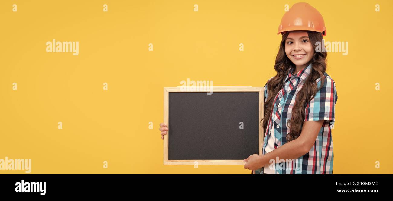 happy workers day. cheerful teen girl laborer hold blackboard. child ...