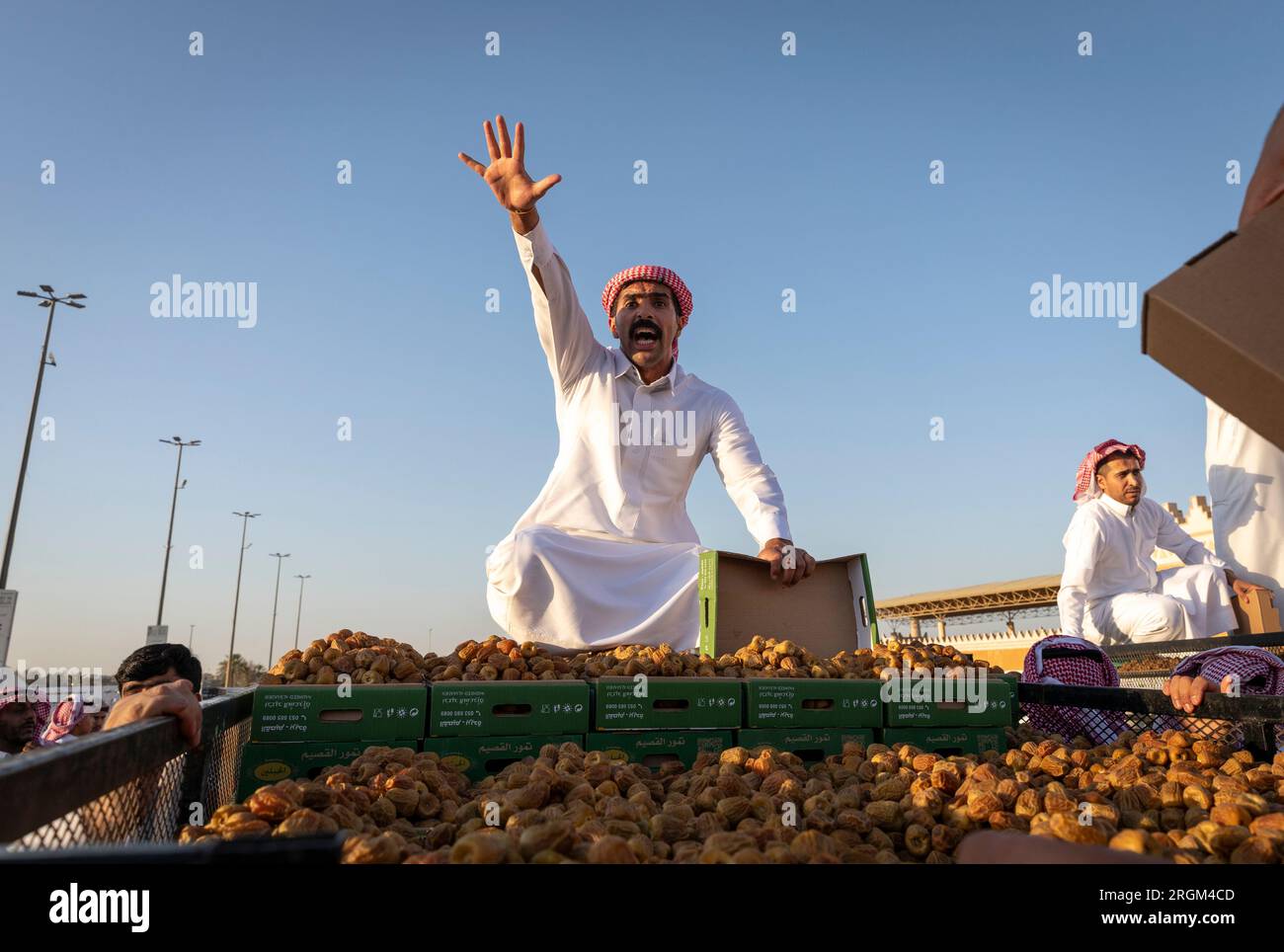 Buraydah, Saudi Arabia, 4th August 2023: arab men selling dates at the ...