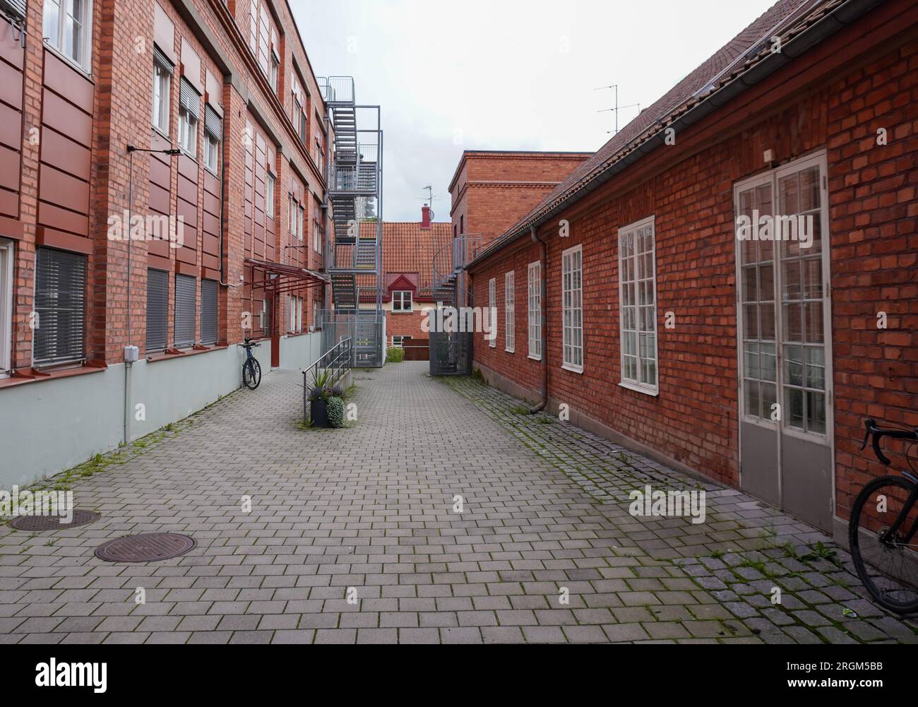 Empty alley amidst buildings hi-res stock photography and images - Alamy