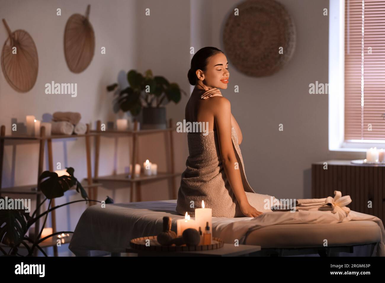 Pretty young woman in spa salon Stock Photo - Alamy