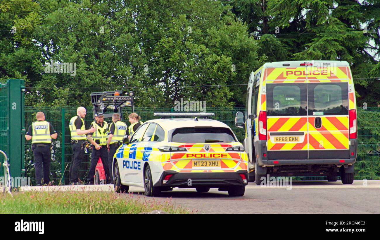 Police car on back of truck hi-res stock photography and images - Alamy