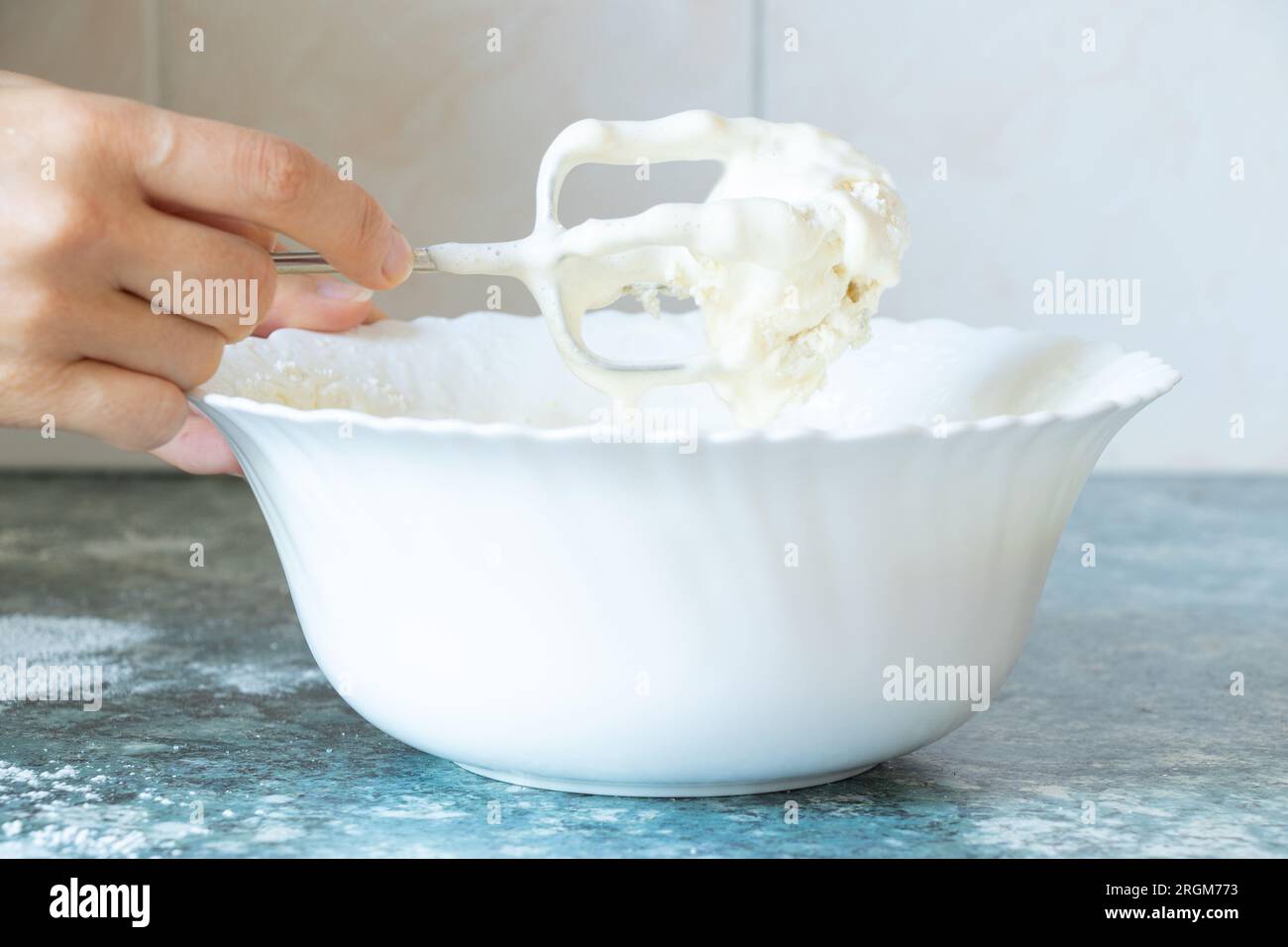 Mixing dough in plate mixer hi-res stock photography and images - Alamy