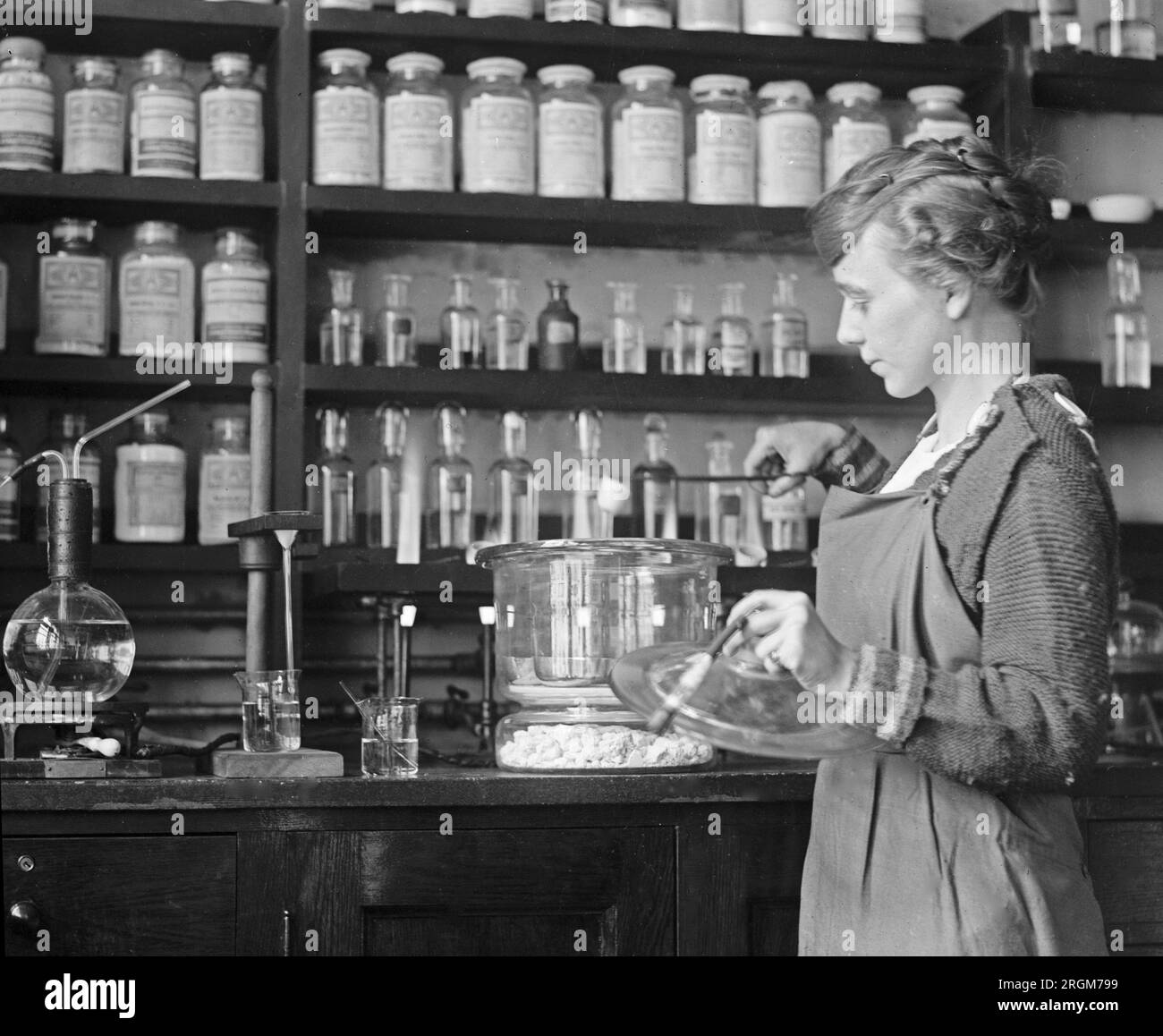 Miss Margaret D. Foster in a laboratory, woman chemist ca. 1919 Stock ...