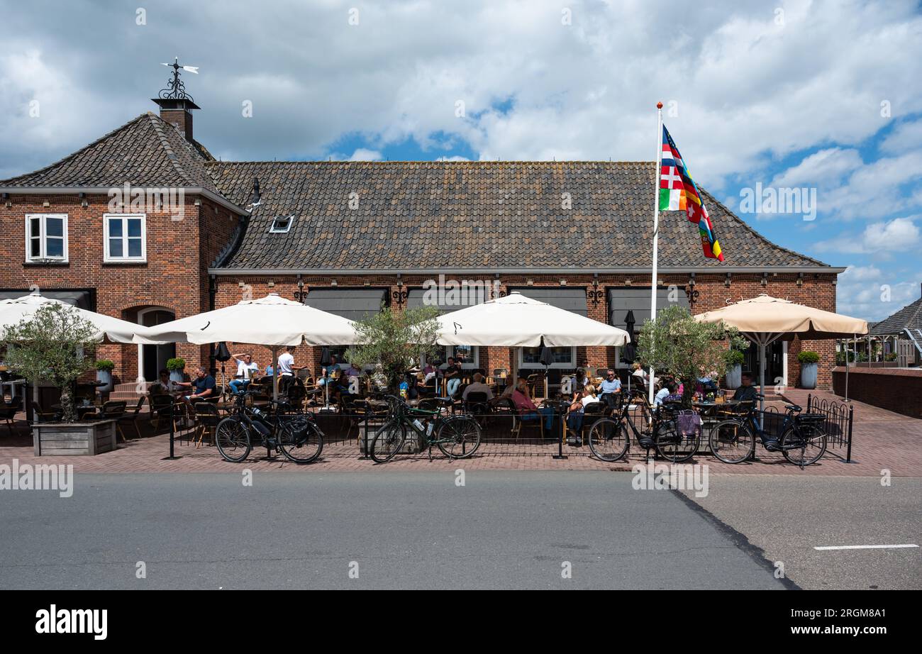 Numansdorp, South Holland, The Netherlands, July 4, 2023 - Cyclist cafe ...